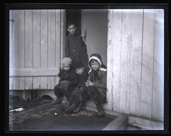 Group at back door of Founder's. Prof[essor] Sharpless' 3 children ...