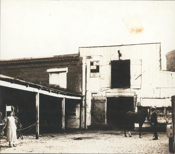 [Stable with man, woman, and horse] [graphic]. | Library Company of ...